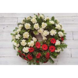 Coroana funerara cu garoafe rosii si minigerbere rosii